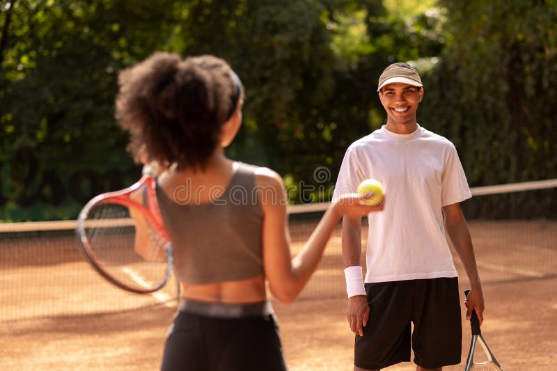 Young People Playing Tennis at the Tennis Courts Stock Image - Image of ...
