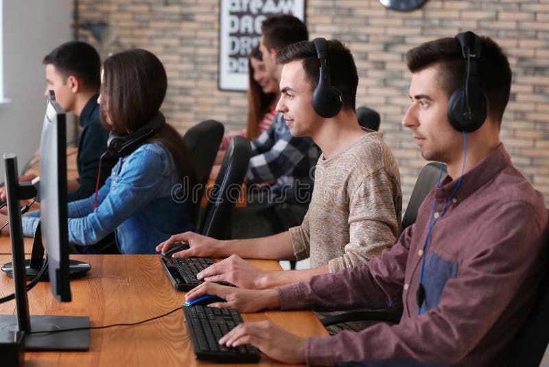 Young People Playing Video Games at Tournament Stock Image - Image of ...