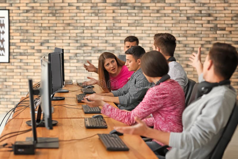 Young People Playing Video Games at Tournament Stock Image - Image of ...