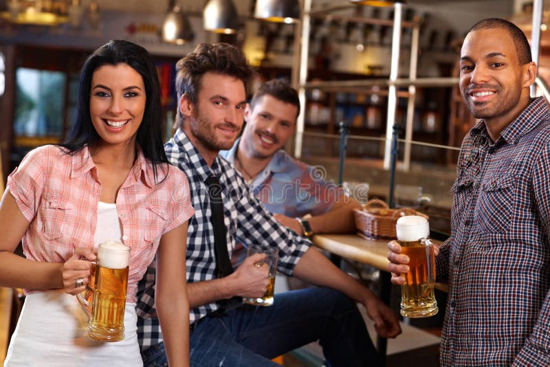 Young people in pub stock photo. Image of drink, enjoy - 31219112
