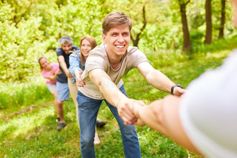 Young People Pull Hands at the Competition Stock Image - Image of ...