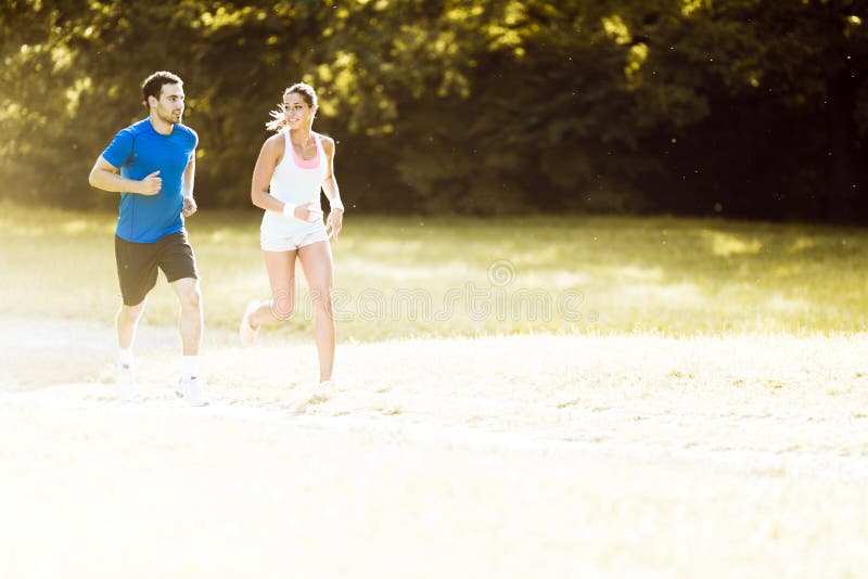 Young People Running in Nature Stock Image - Image of runner, fitness ...