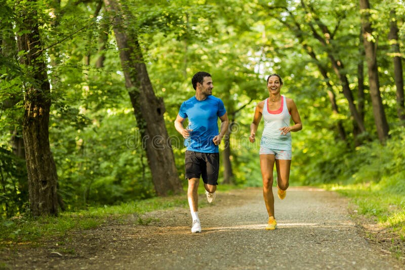 Young People Running in Nature Stock Photo - Image of female, active ...