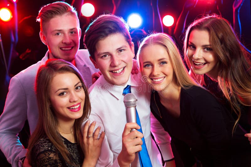Young People Singing at Party Stock Photo - Image of birthday, adults ...