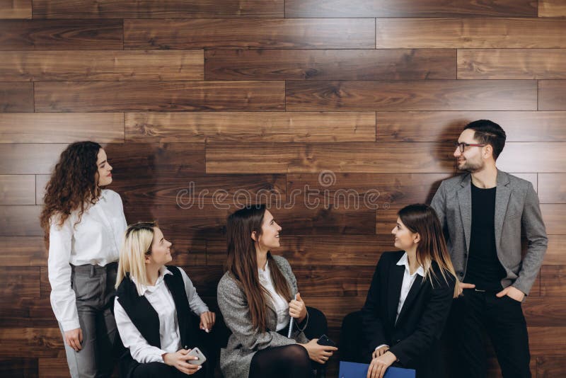 Beautiful Business People are Using Computer and Smiling while Working ...