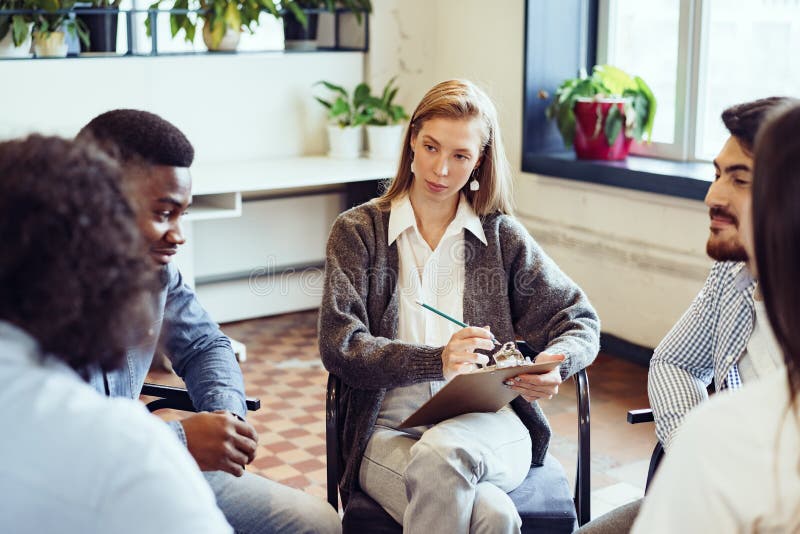 Young People Sitting in a Circle and Having a Discussion Stock Image ...