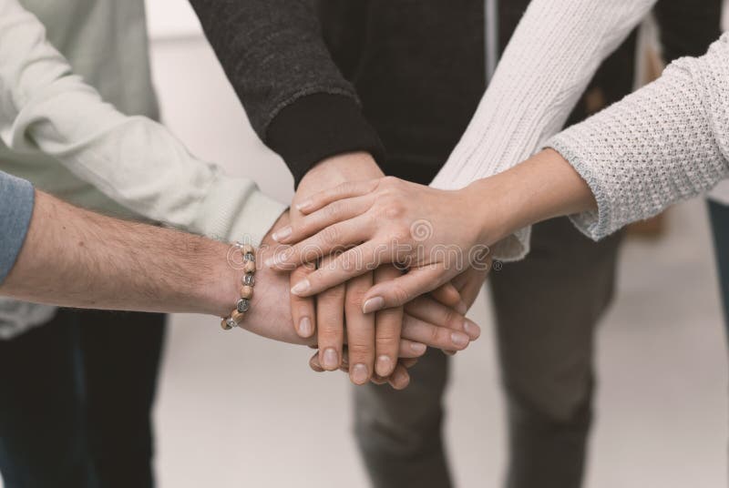 Young People Stacking Hands Stock Photo - Image of togetherness ...