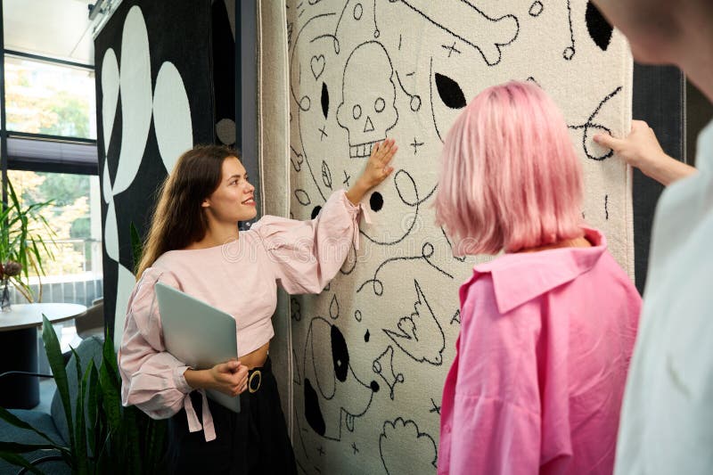 Young People Stand at a Rack with Carpet Samples Stock Photo - Image of ...