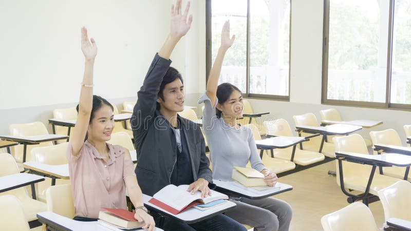 Young People Student Push Hand Up in the Indoor Classroom Stock Image ...