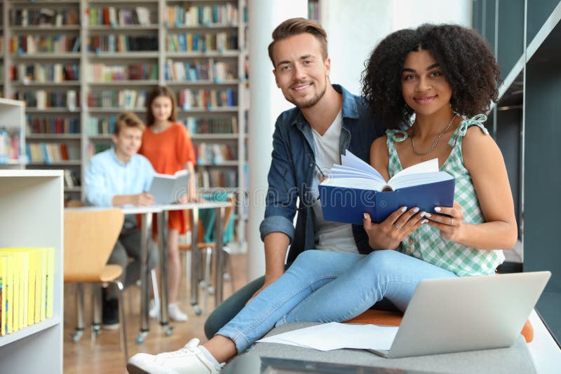 Young People Studying Together in Library Stock Photo - Image of afro ...