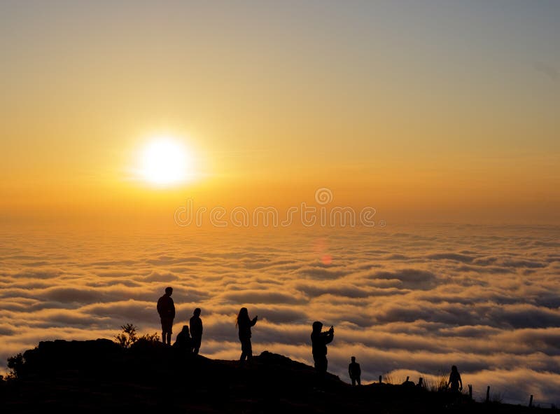 Young People at Sunset with a Sea of Clouds on Mount Jaizkibel, Euskadi ...