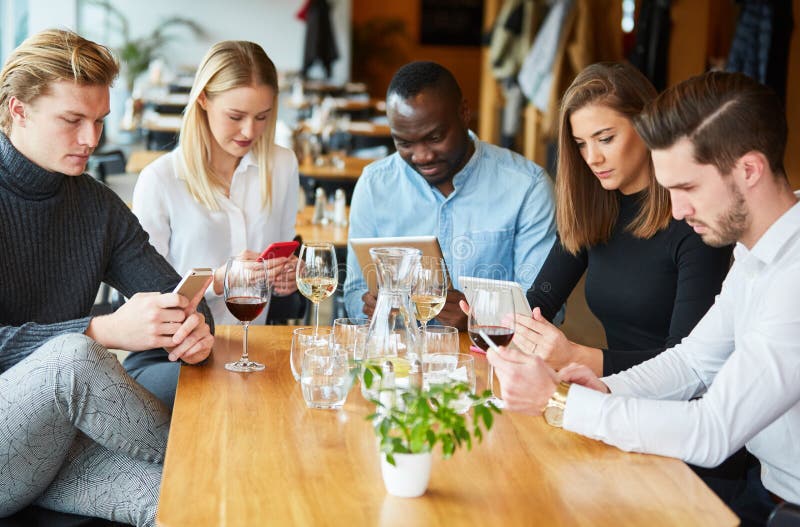 Young People Surf with Mobile Phone and Smartphone Stock Photo - Image ...