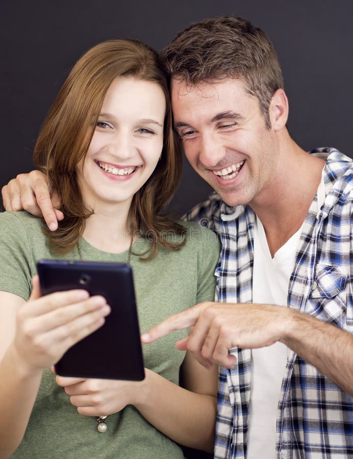 Young people with tablet stock photo. Image of confident - 41420304