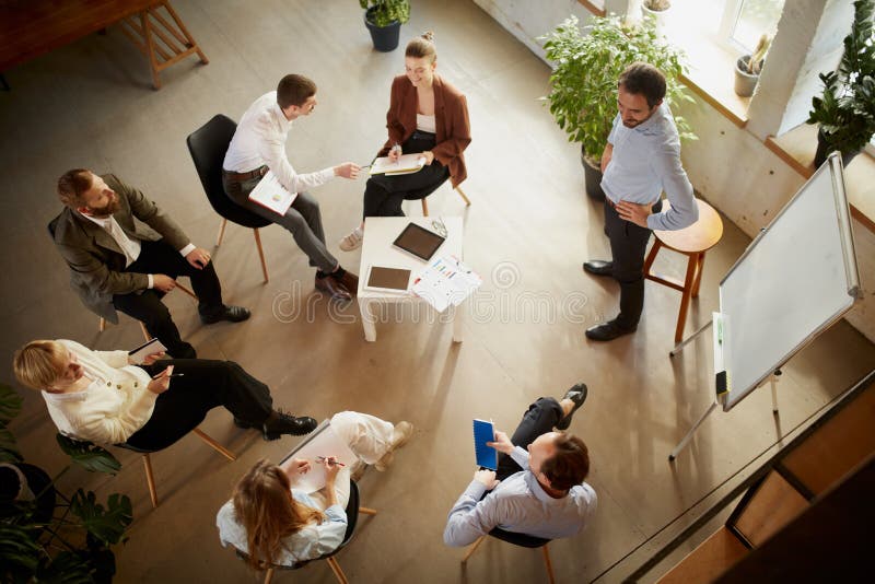 Young People Talking, Working, Discussing Problems and Ideas with ...