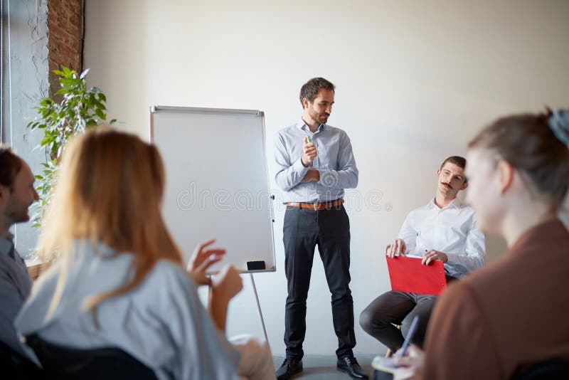 Young People Talking, Working, Discussing Problems and Ideas with ...