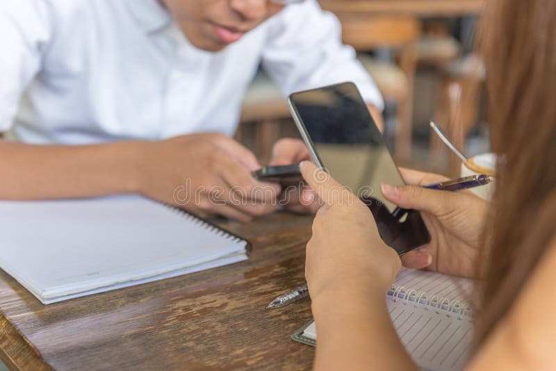 Young People Using Phone To Surf the Internet Stock Photo - Image of ...