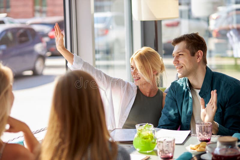 Young People are Waiting for Friend in Cafe Stock Photo - Image of ...