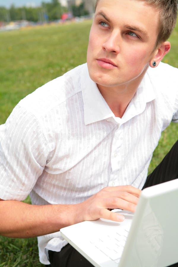 Young person with laptop stock image. Image of computer - 5581293