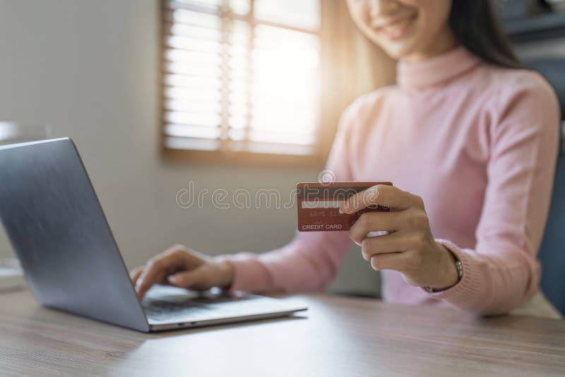 Young Person Using Credit Card and Laptop Computer. Online Shopping, E ...