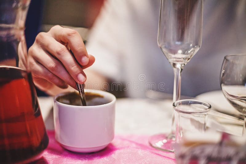 Young Persons Hand Mixing Sugar into a Cup of Coffee Stock Photo ...