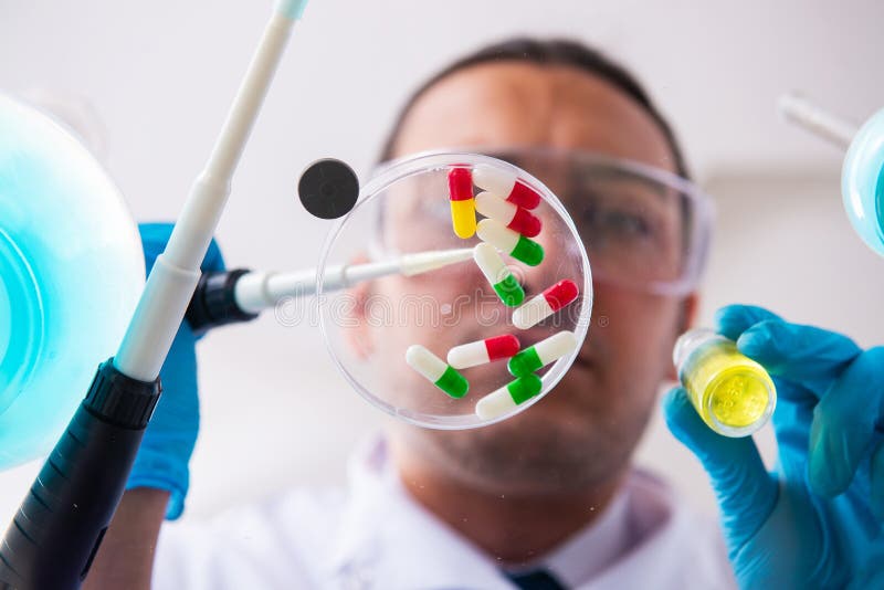 Young Male Pharmacist Working in the Lab Stock Image - Image of ...