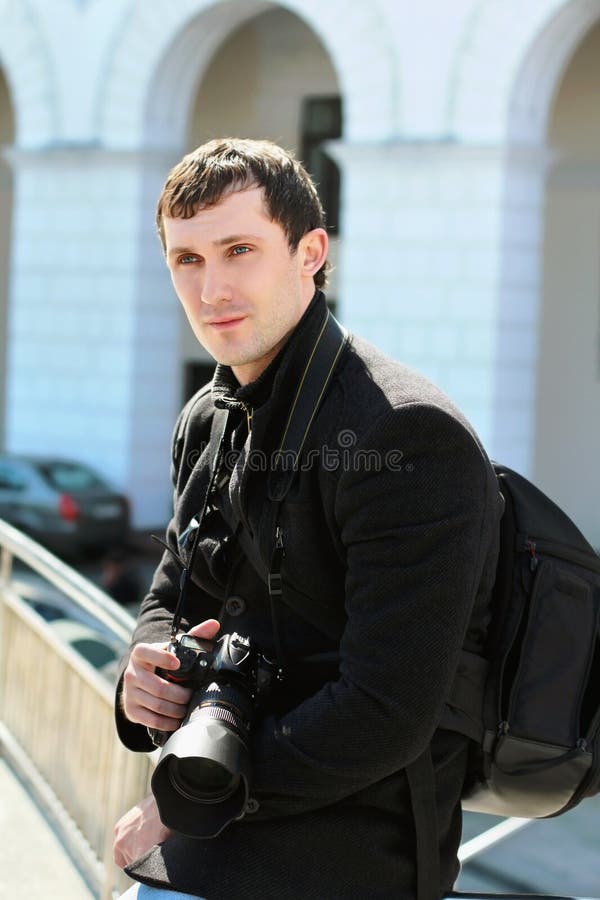 Young Photographer with Camera Stock Image - Image of outside, casual ...