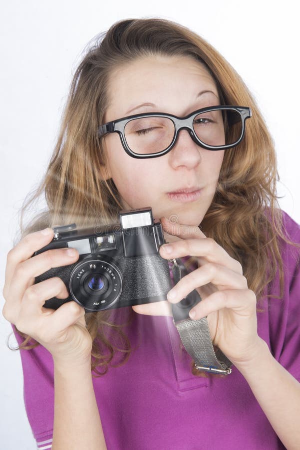 Nerd Boy With Camera Around His Neck And Computer Under His Arm Stock ...