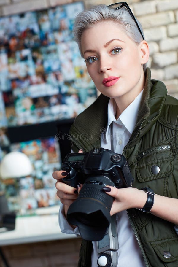 Young photographer stock photo. Image of female, contact - 188079538