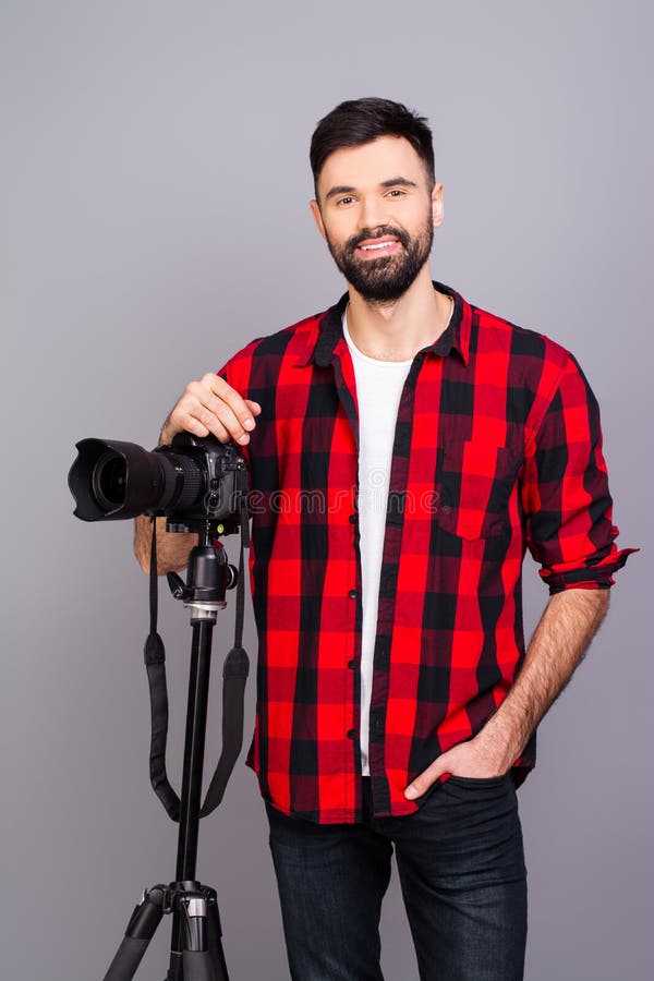 Young Photographer Preparing for Taking Pictures with Digital Camera ...