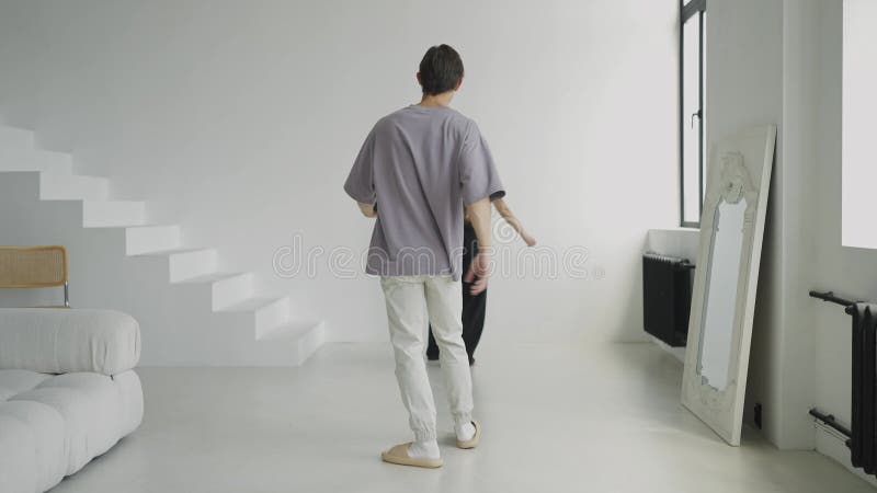 Young Photographer Shoots Model and Shows Examples of Poses for Picture ...