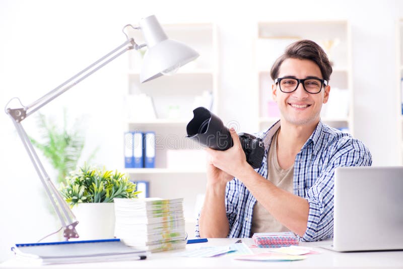 Young Photographer Working in Photo Studio Stock Photo - Image of ...