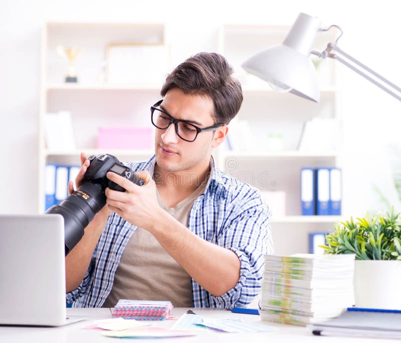 Young Photographer Working in Photo Studio Stock Photo - Image of ...