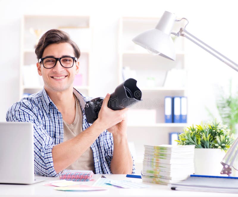 Young Photographer Working in Photo Studio Stock Photo - Image of ...