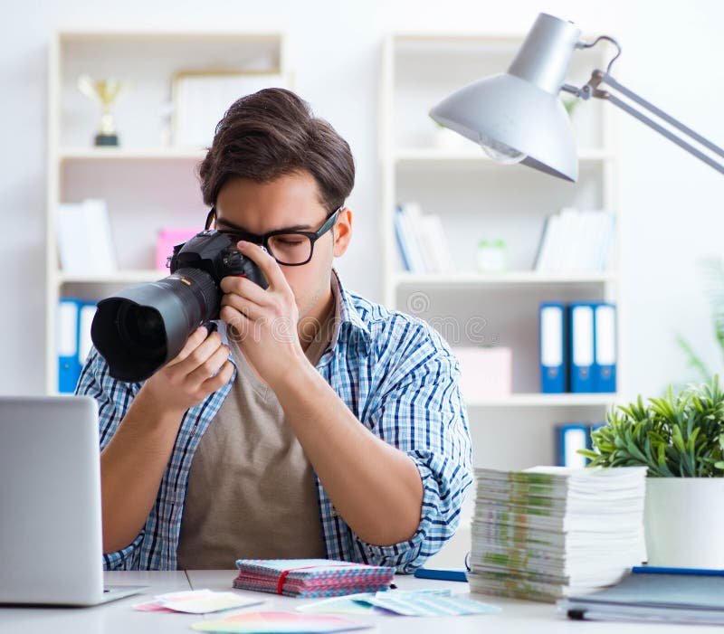 Young Photographer Working in Photo Studio Stock Photo - Image of ...