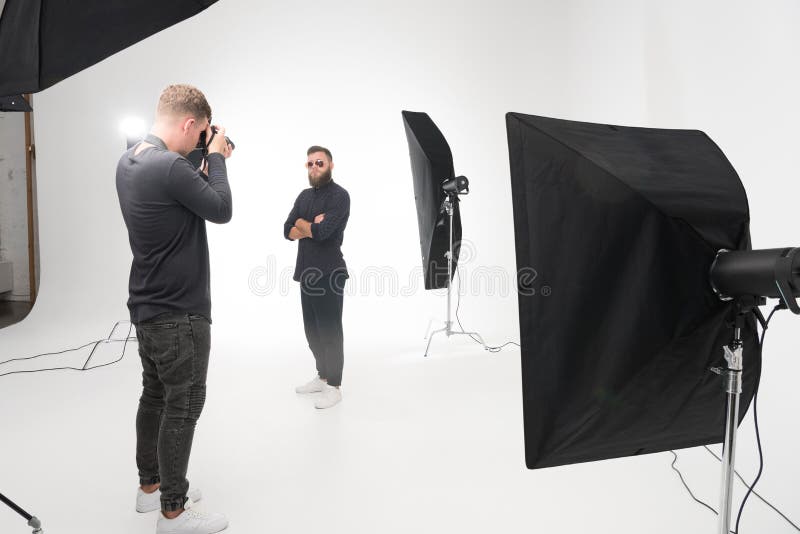 Photographer Working in Studio with Model Stock Photo - Image of ...