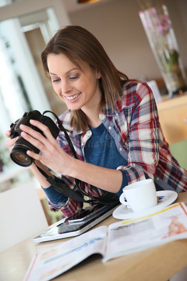 Young Photography Student Working in the Coffee Shop Stock Photo ...
