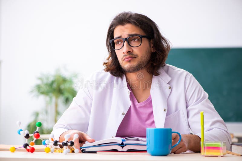 Young Male Physicist in the Classroom Stock Image - Image of scientific ...