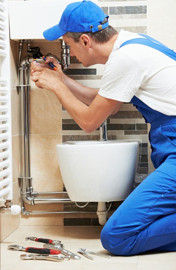 Plumber Fixing Sink in Kitchen Stock Photo - Image of mechanic, labor ...