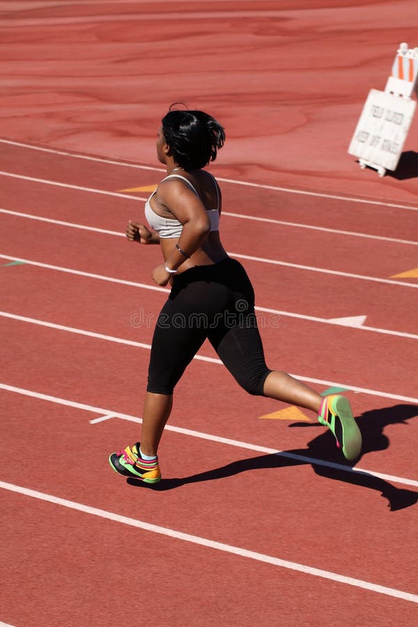 Plump Black Woman Running Outdoors on Track Stock Photo - Image of ...
