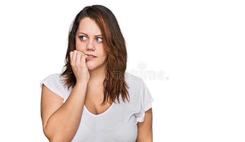 Young Plus Size Woman Wearing Casual White T Shirt Looking Stressed And