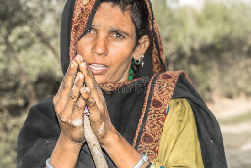 A Young Poor Lady is Begging Cause of Poverty Stock Photo - Image of ...