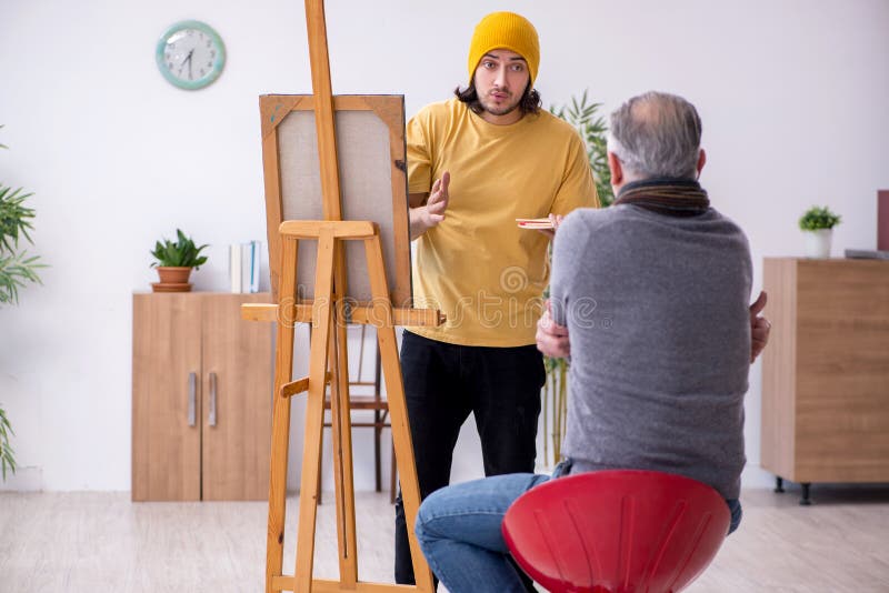 Young Portraitist and Old Male Model Stock Photo - Image of model ...