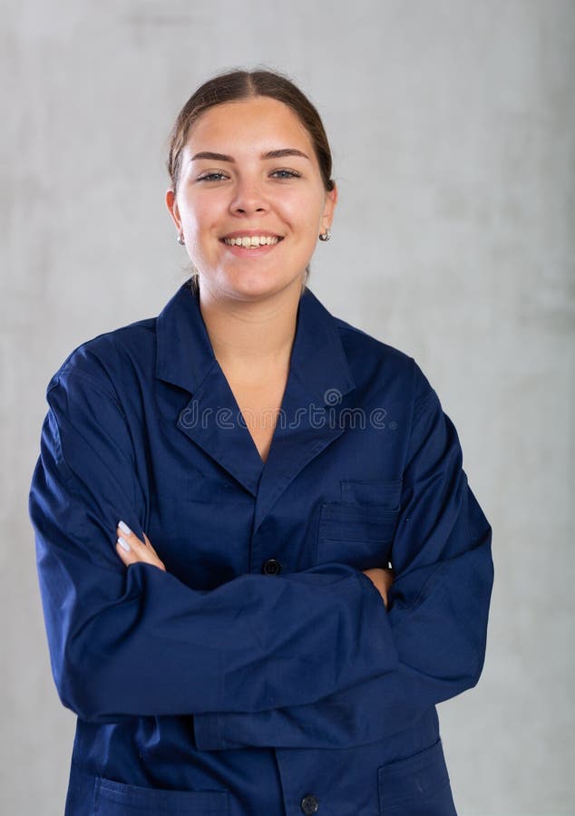 Young Woman Posing in Working Uniform in Studio Stock Photo - Image of ...