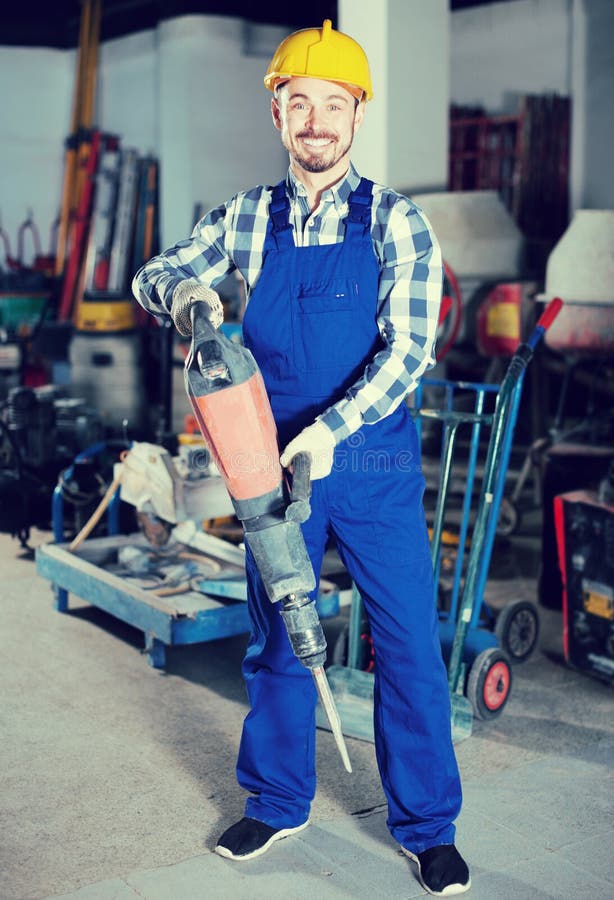 Young Positive Man Worker Practicing Jackhammer Stock Image - Image of ...