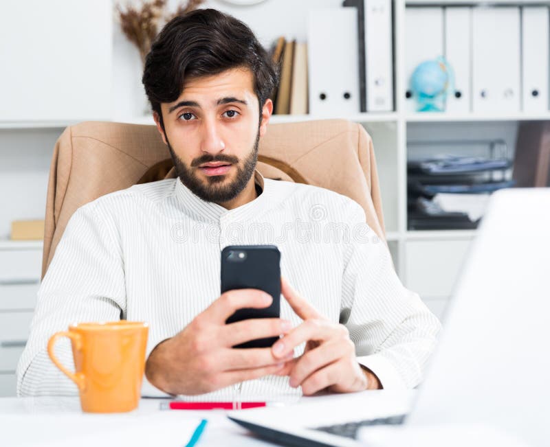 Office Worker Using His Smartphone Stock Photo - Image of portrait ...