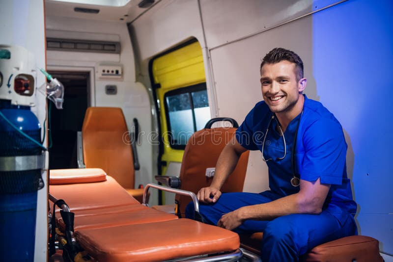 Young Positive Paramedic in a Blue Uniform on Duty Stock Image - Image ...