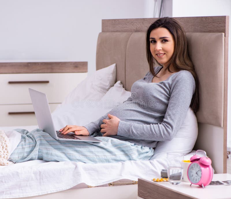 Young Pregnant Woman in the Bedroom Stock Photo - Image of birth ...