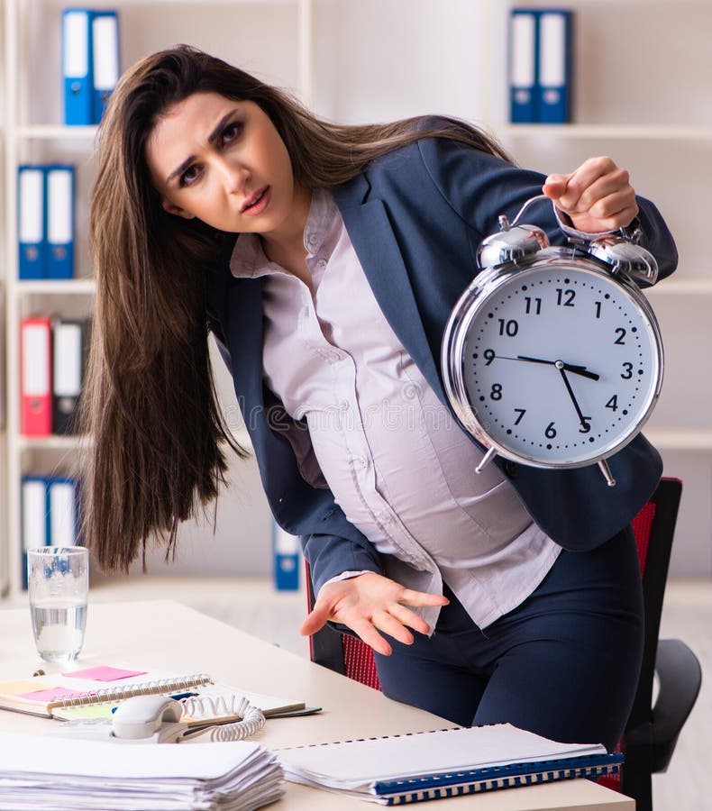 Young Pregnant Woman Working in the Office Stock Photo - Image of labor ...