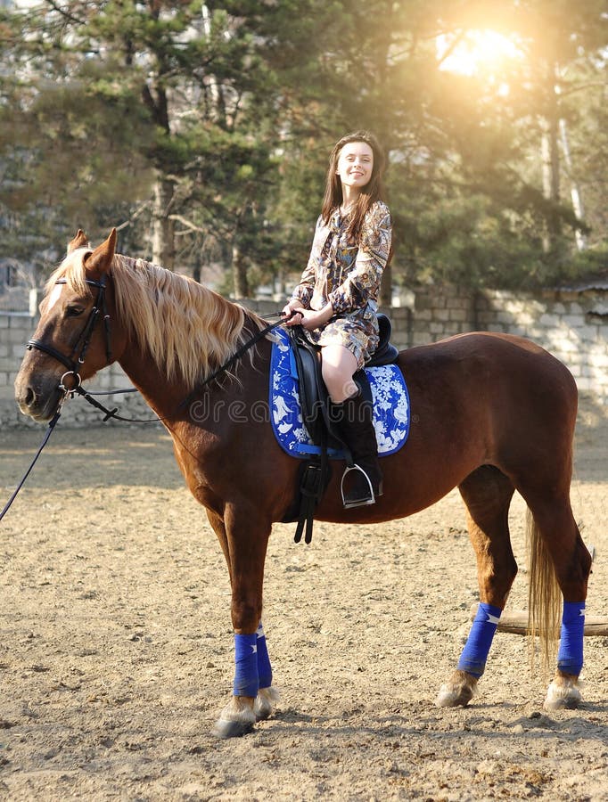 Young Pretty Brunette Riding Horse Outdoor Stock Image - Image of ...