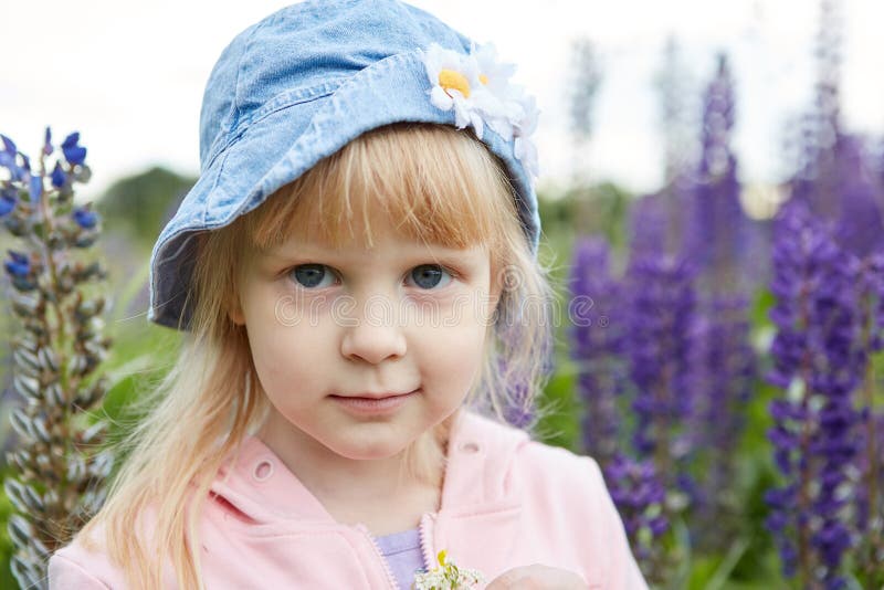 Young Pretty Girl Child Outdoors Stock Photo - Image of flower, plant ...